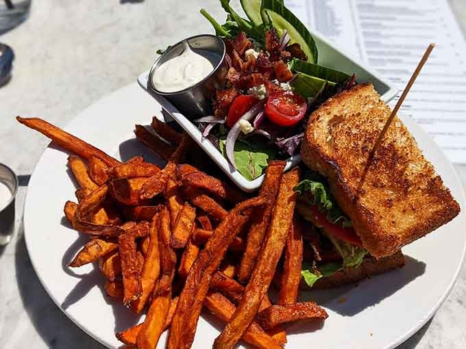 Sweet potato fries piled high enough to cause friendly disputes over the last crispy piece at your table.
