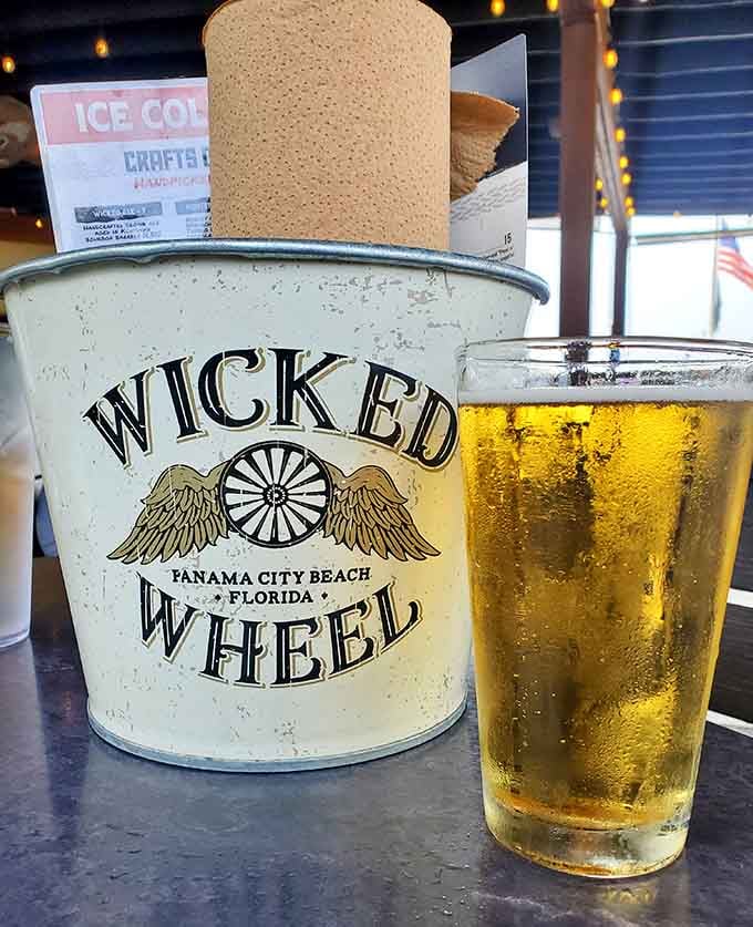 Cold beer in a souvenir bucket: because some memories are worth taking home, even if they're just containers.