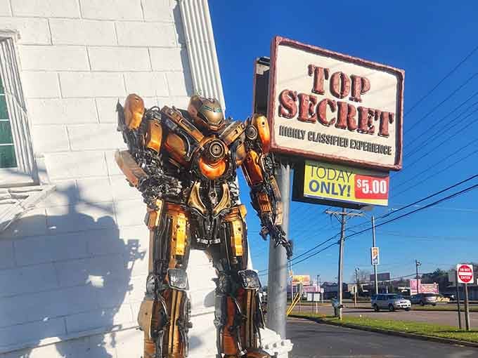 One of several mechanical guardians watching over this topsy-turvy monument to architectural rebellion and fun.