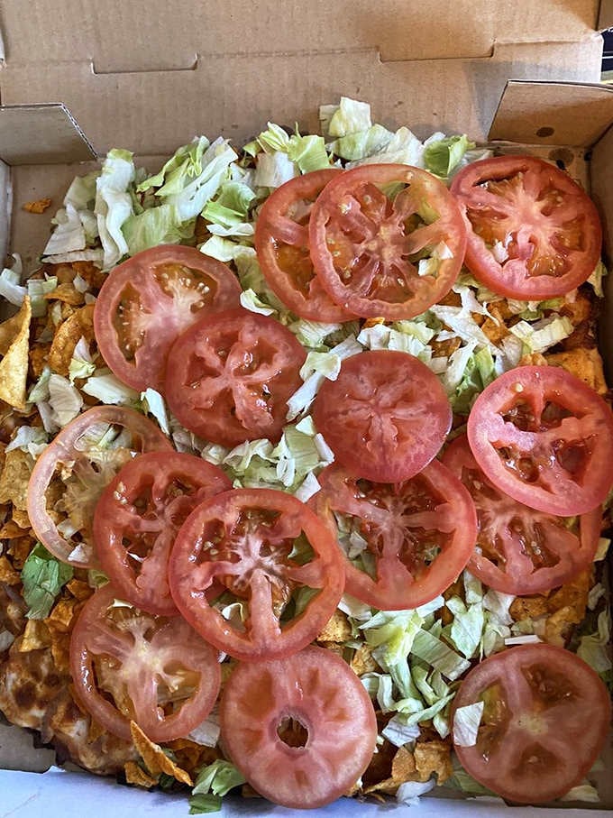 The taco pizza concept sounds wild until that first bite makes you wonder why this isn't everywhere already.