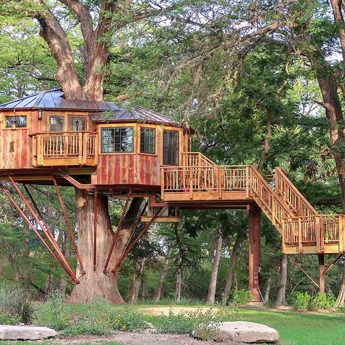 Multiple treehouses dot the property, each one more charming than the last, like a choose-your-own-adventure book come to life.