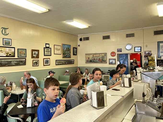 Families gathering for ice cream like it's 1955, except now everyone's got smartphones documenting the deliciousness.