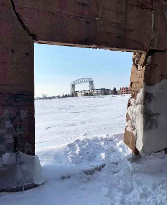 Looking through the opening frames the Aerial Lift Bridge perfectly, like the world's strangest picture window.