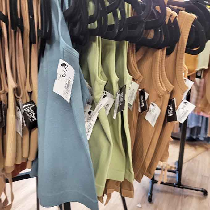 Tank tops in every shade imaginable, color-coded for shoppers who appreciate organization and bare arms equally.