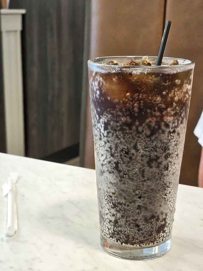 A cold soda with enough ice to keep it frosty through your entire meal, the simple pleasures done right.