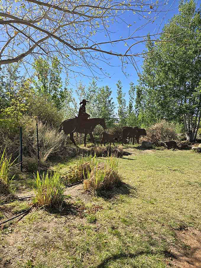 Western silhouettes against spring greenery capture the spirit of frontier days with decidedly better landscaping than pioneers had.