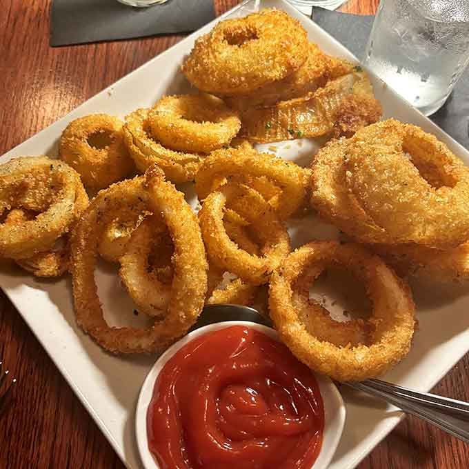 Golden, crispy onion rings that could make a vegetarian reconsider their life choices, at least temporarily.