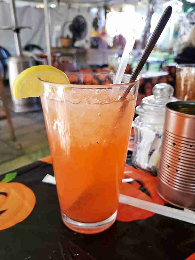 Strawberry lemonade that's actually pink and refreshing, not that neon stuff that glows suspiciously in sunlight.