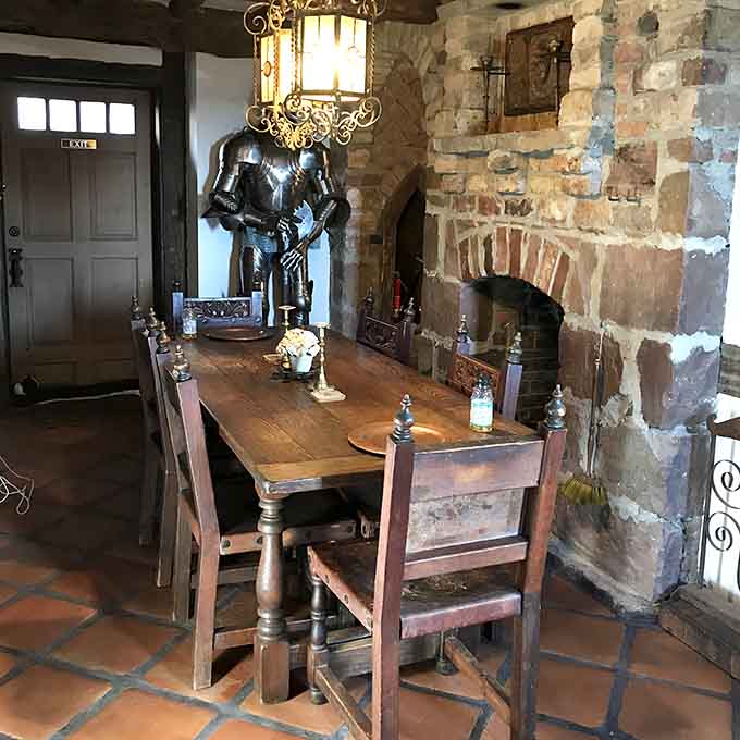 A suit of armor casually guarding your breakfast table, because normal dining rooms are for people without imagination.