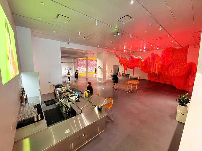 The sweeping view reveals multiple installations coexisting peacefully, like different TV channels playing simultaneously in your brain.