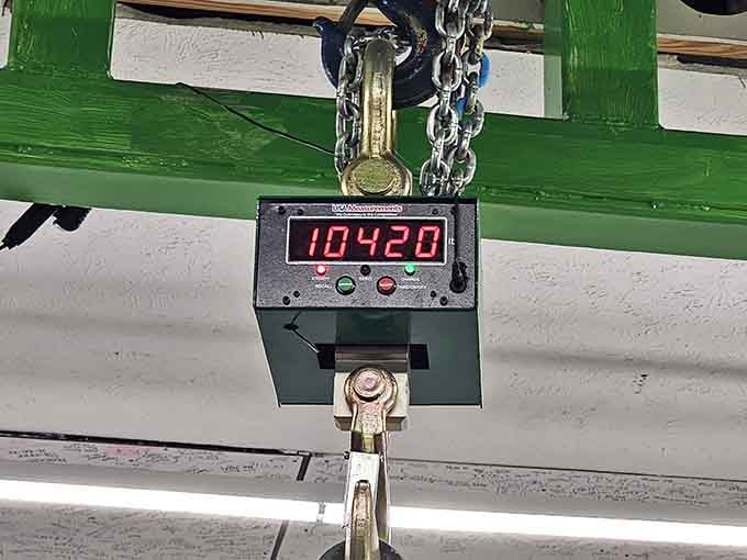 That digital scale isn't decorative, it's necessary equipment when your art project weighs more than most motorcycles do.