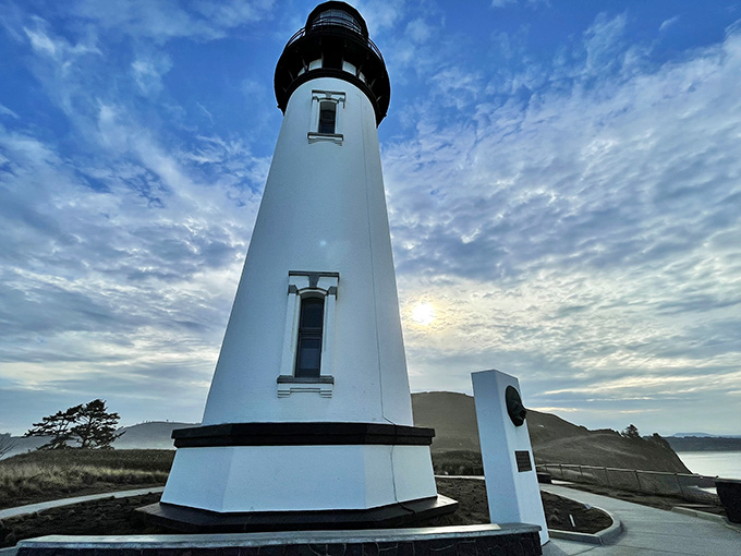 Morning light transforms the keeper's quarters into something from a coastal postcard your grandmother would've sent in 1952.