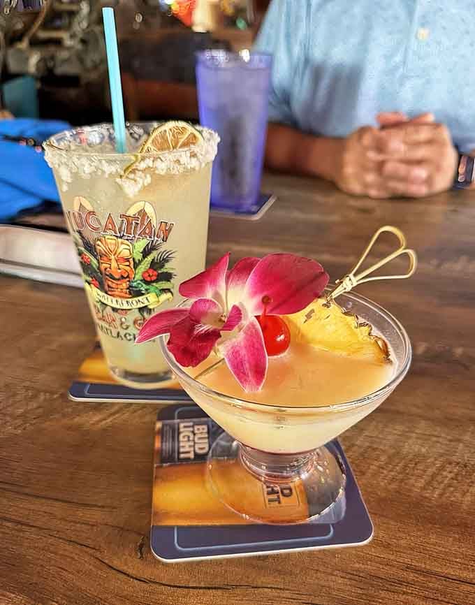 Tropical cocktails garnished with orchids and pineapple make you feel like you're on vacation even if you're just skipping work.