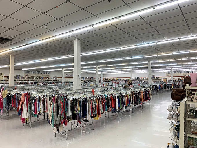 Rows of clothing stretch toward infinity, organized better than most people's actual closets at home.
