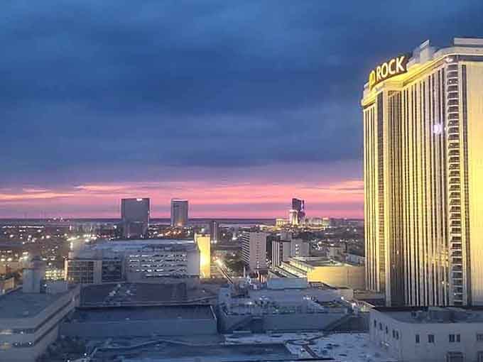 That gorgeous pastel sky over the cityscape proves natural beauty comes free, even when you're living on a budget.