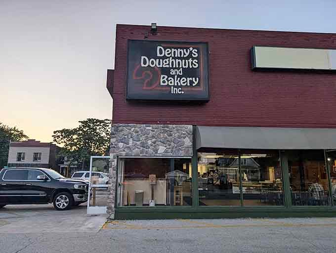 The classic brick facade and prominent signage announce this bakery's been feeding the community longer than most chain stores have existed.