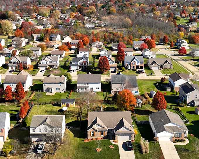 Fall colors explode across neighborhoods where front yards are spacious and neighbors still wave from their porches.