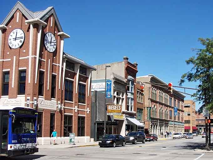 Twin clock faces keep time on a corner where old-world craftsmanship meets everyday neighborhood life.