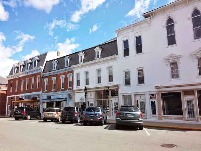 Mansard roofs and tall windows showcase Victorian elegance that refuses to apologize for being a little bit fancy.