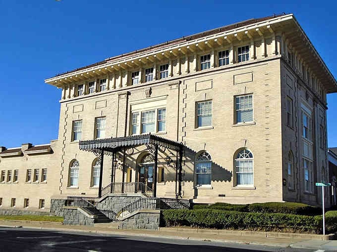 That grand entrance with ornate ironwork shows Jamestown takes pride in its public buildings, welcoming residents with architectural elegance.