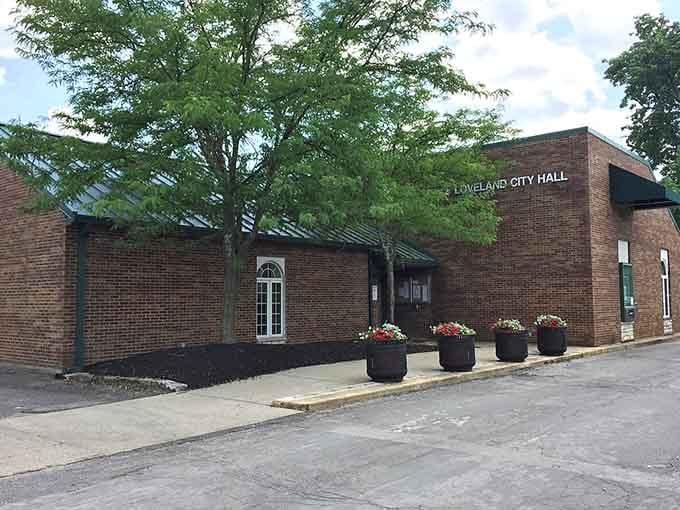 Flower-filled planters welcome visitors to City Hall, where community matters are handled with neighborly care and attention.