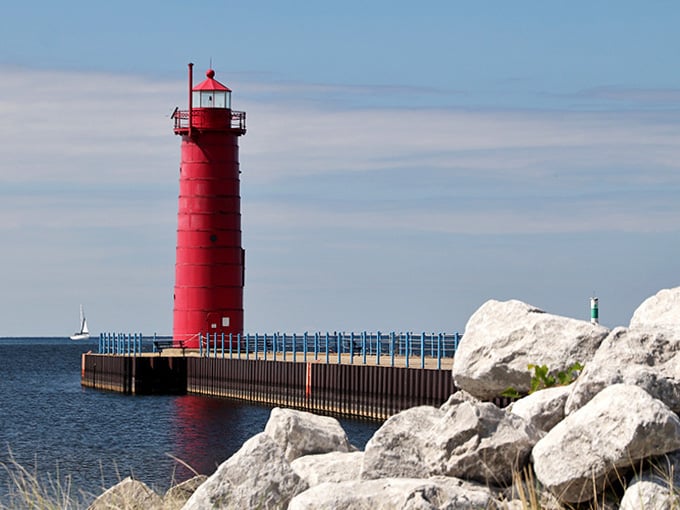 This crimson sentinel rises from the breakwater like a giant lipstick marking the harbor entrance with authority.