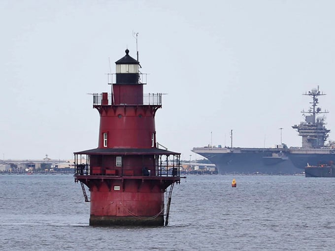 This red tower rises from the water like a chess piece that found the perfect spot for checkmate.