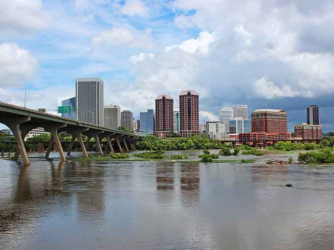 The James River flows past Richmond's impressive skyline, proving that nature and urban life can coexist beautifully together.