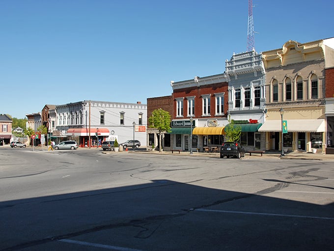 Classic storefronts stand shoulder to shoulder like they've been holding up Main Street since your grandparents were young.