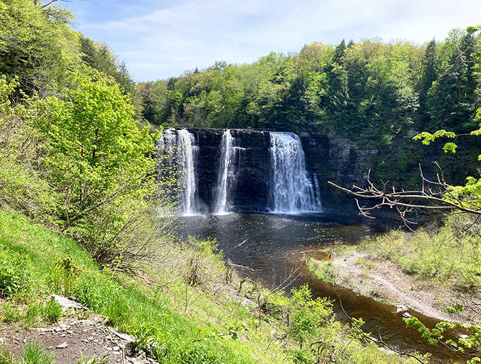 Three distinct waterfalls plunge side by side, because apparently one spectacular cascade just wasn't enough for this spot.