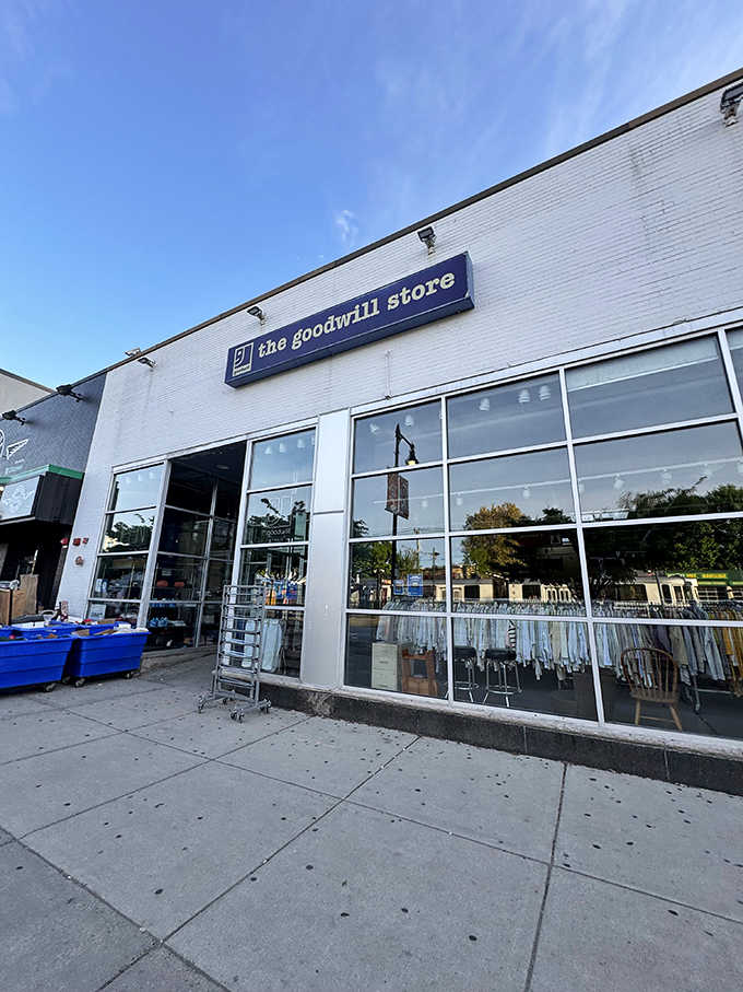 The modern glass storefront lets you peek inside at the treasures before you even walk through the door.