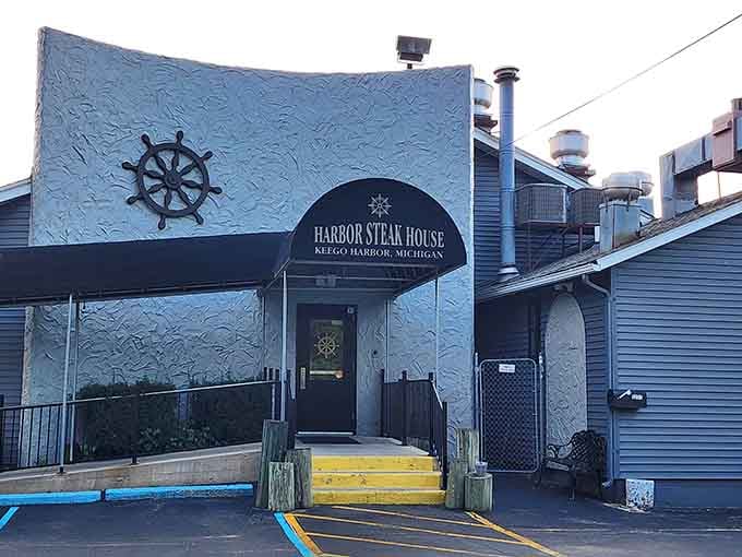That ship's wheel decoration and nautical theme perfectly complement the waterfront location where great steaks meet lakeside views.