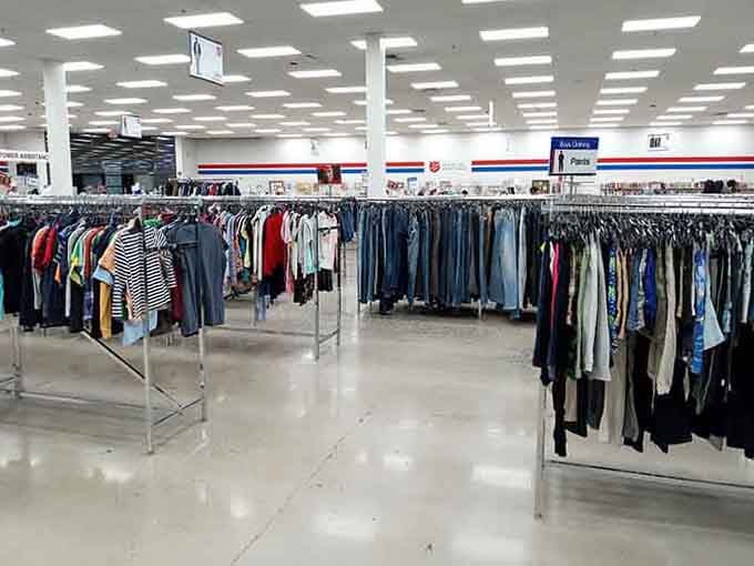 Rows of clothing stretch endlessly under bright lights, organized better than some department stores we could mention.