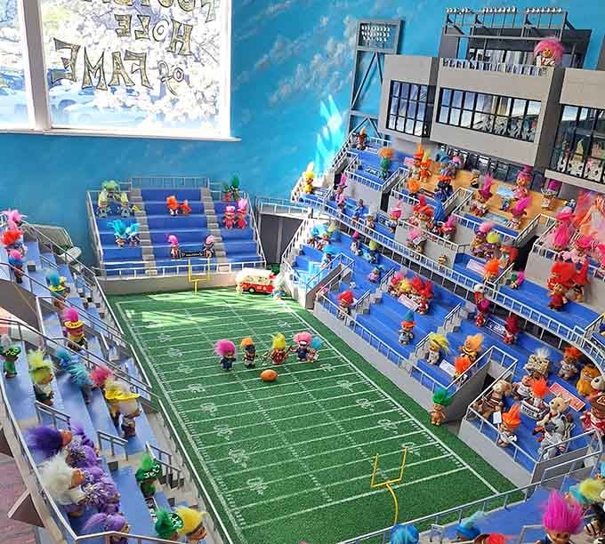 Tiny troll dolls create their own Super Bowl spectacle, complete with colorful fans filling every seat.