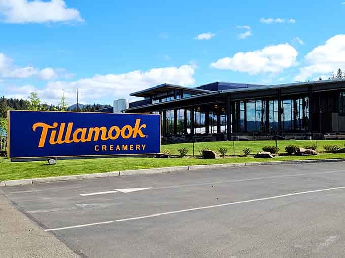 The cheerful yellow sign welcomes visitors to a place where cheese dreams come true and ice cream flows freely.