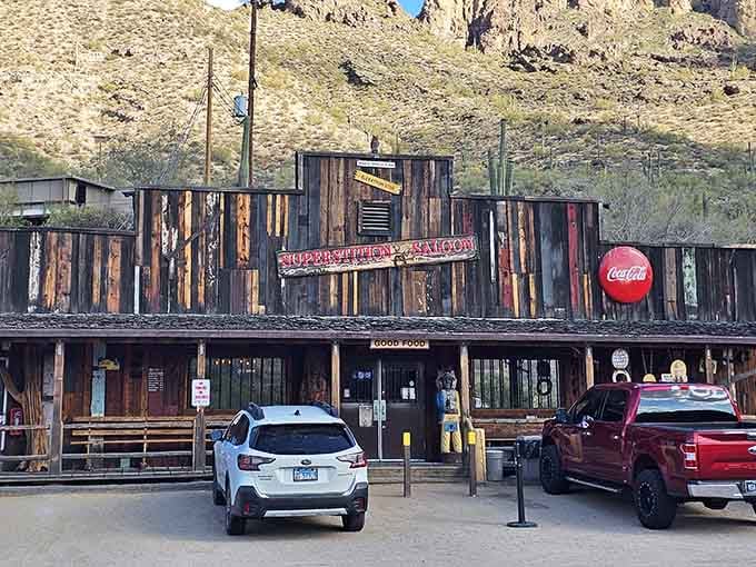 The weathered wood and mountain backdrop create a scene straight from every classic Western film you've ever loved.
