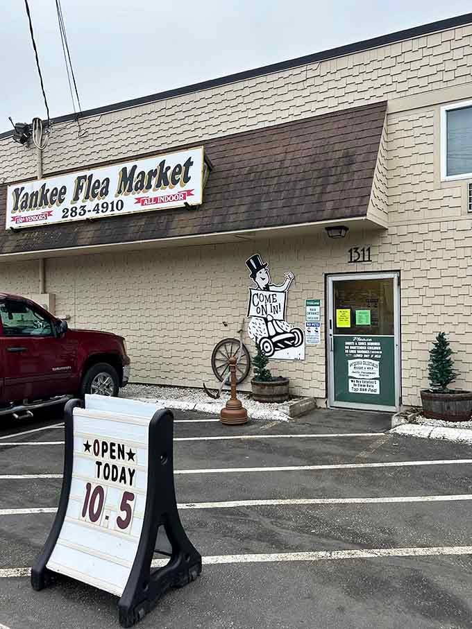 That cheerful Uncle Sam cutout waves you inside, where decades of bargains await behind doors that never disappoint serious shoppers.