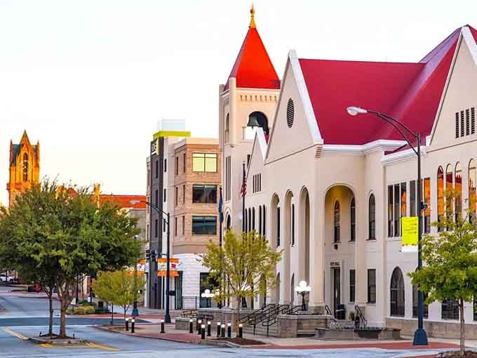 Those striking red roofs catch the golden hour light like architectural jewels in an affordable retirement crown.
