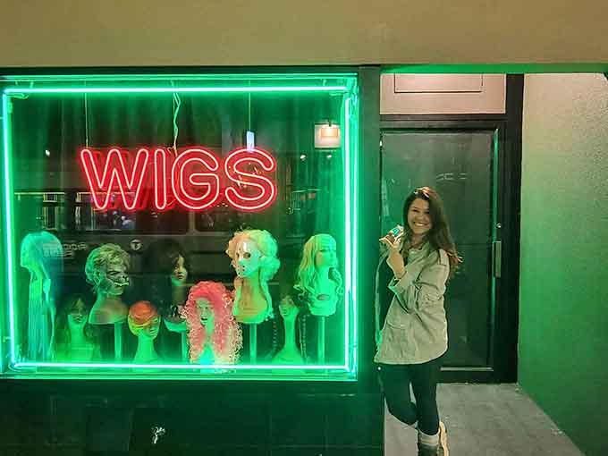 The colorful wig display adds whimsy to this hidden gem, proving great steaks can come with personality and flair.