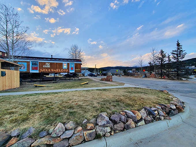 Sunset paints the sky above this mountain town treasure where wooden carousel creatures bring joy to all ages.