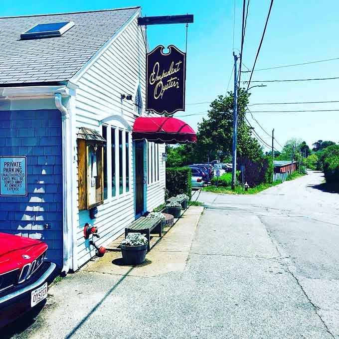 Charming Cape Cod corner where weathered shingles, nautical awnings, and quiet streets whisper of simpler seaside summers and lobster rolls waiting inside.