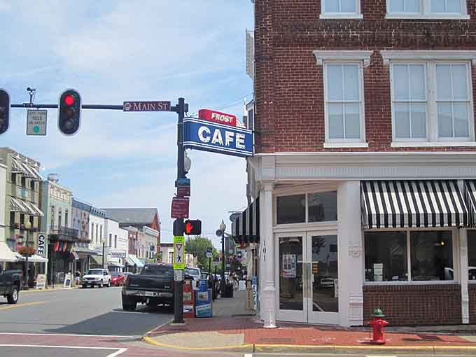 That vintage cafe sign points the way to conversations and coffee that both taste better when shared.