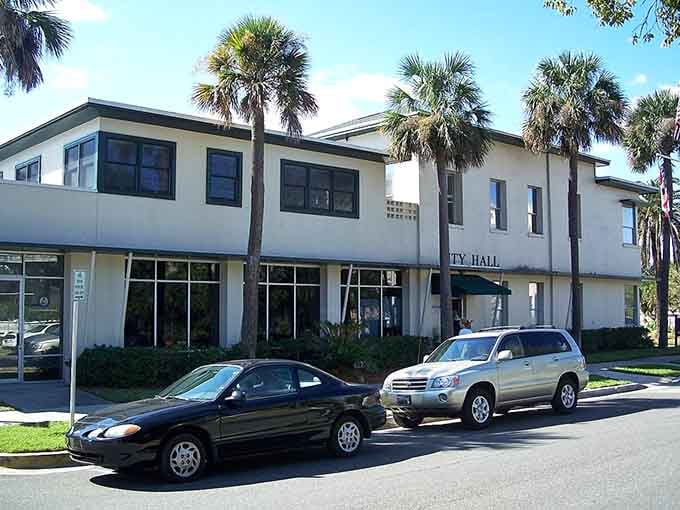 Those palm trees standing guard by City Hall remind you this isn't just any coastal town—it's pure Florida elegance.