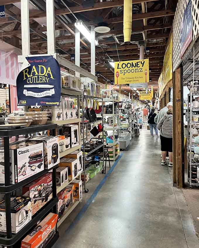 Kitchen gadgets and cutlery line these shelves like a chef's dream come true, minus the fancy restaurant prices and attitude.