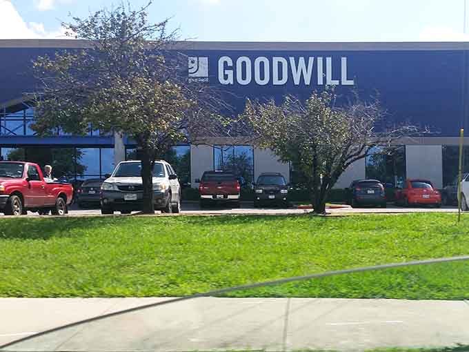 Lush green lawn and mature trees create an unexpectedly pleasant setting for serious bargain hunting adventures ahead.