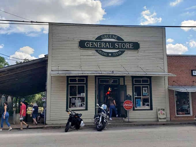 The classic general store facade draws visitors inside with promises of old-fashioned charm and treasures from a simpler time.