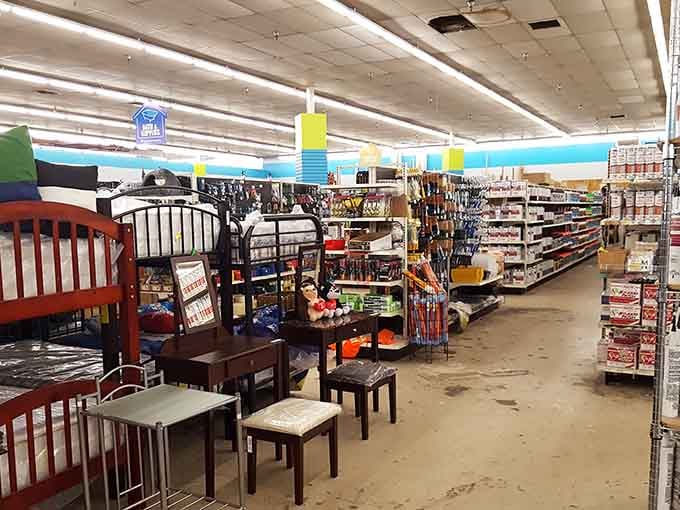 Furniture and fixtures crowd the aisles in organized chaos, where your next DIY project waits patiently for discovery.