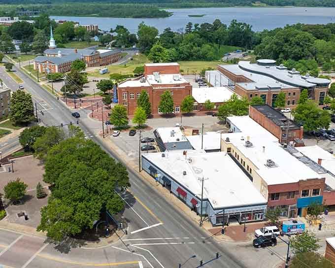 Church steeples and water views create that perfect small-city combo of faith, nature, and affordable living options.