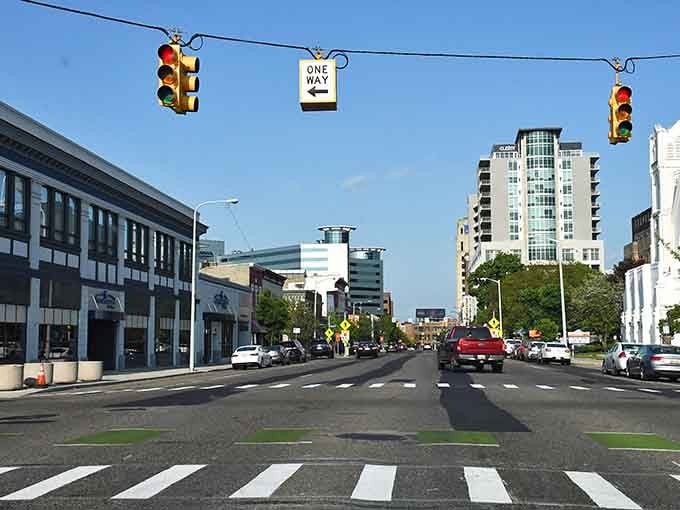 Mature trees line sidewalks where pedestrians actually outnumber cars, creating the walkable neighborhood our parents took for granted back then.