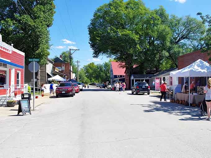 Summer brings market tents and classic cars to streets where community spirit thrives in the Missouri sunshine.